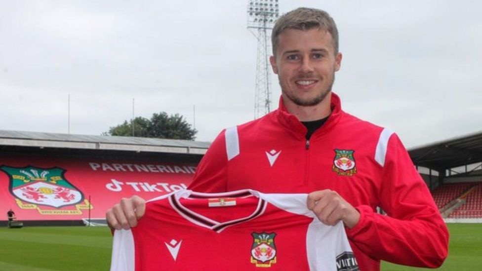 James Jones: Lincoln City midfielder joins Wrexham - BBC Sport