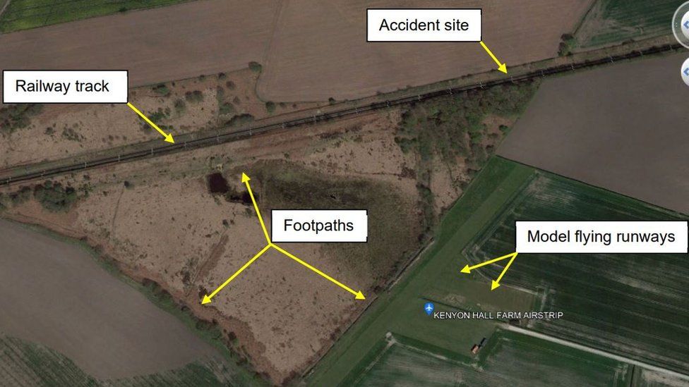 Model plane hit by train after Warrington railway line crash - BBC News