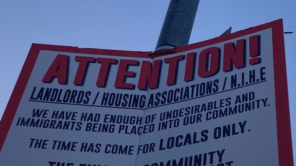 Finaghy: Man afraid to leave home over anti-immigrant signs - BBC News