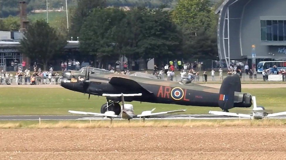 RAF Coningsby: Lancaster bomber returns home after service - BBC News
