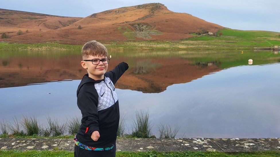 Luke Mortimer: Amputee's fundraising climb hits £23k - BBC News