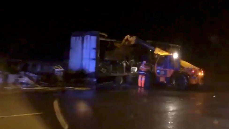 Washing machine lorry catches fire on A1 - BBC News