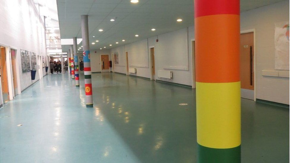 Derby school decorates interiors with flags of the world - BBC News