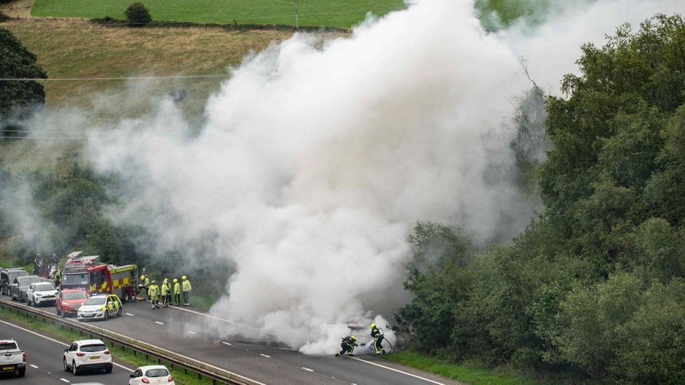 Vehicle catches fire causing delays on Devon road - BBC News