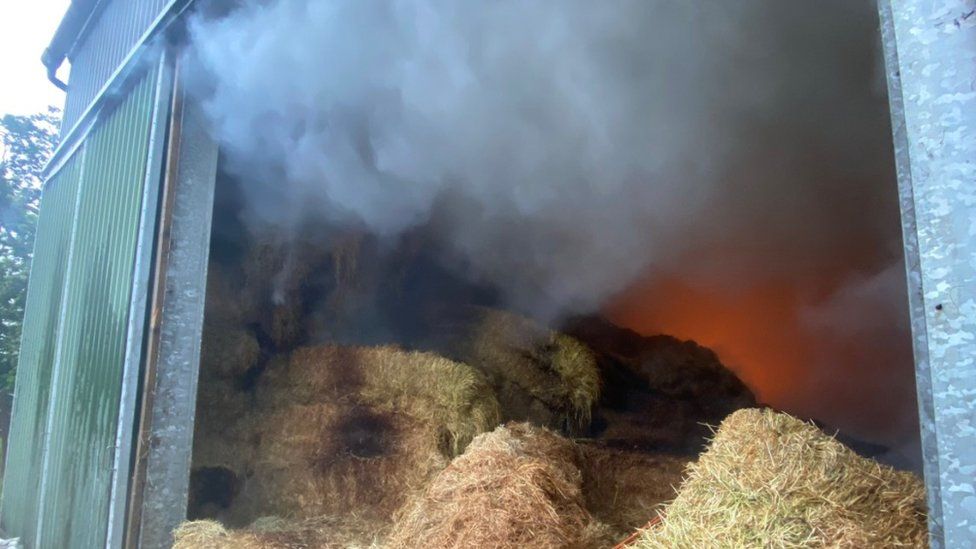 Fire crews tackle 400-tonne hay and straw fire at Corfe Castle barn ...