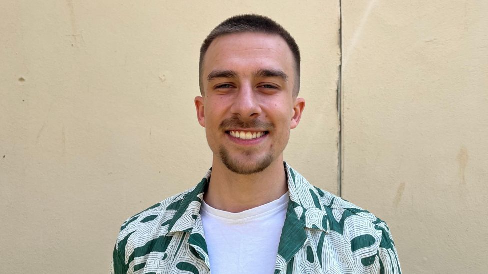 Ironman competitor raising money after heart 'rupture' at 19 - BBC News