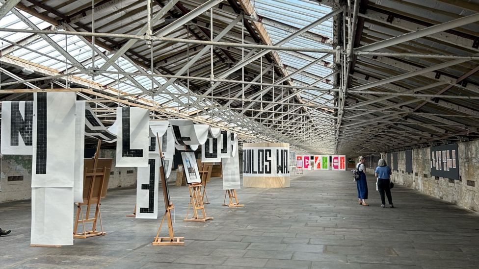 Shipley letterpress murals go on show at historic mill - BBC News