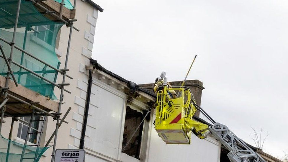 Northampton firefighters remain at scene of town centre blaze - BBC News