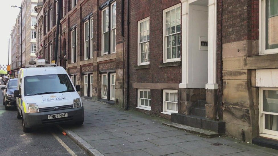 Liverpool death: Murder arrest after woman falls from building - BBC News