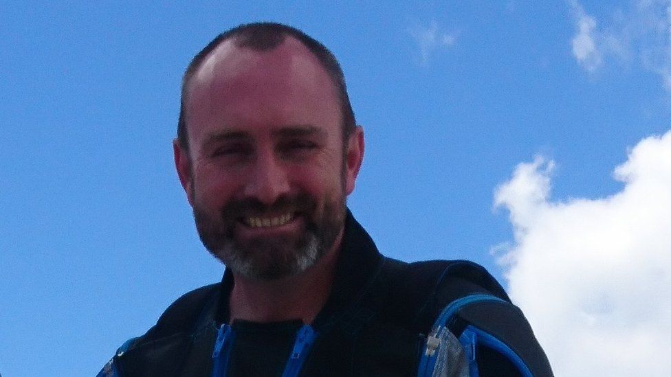 Wingsuit jumper Rob Haggarty 'hit rock face three times' - BBC News