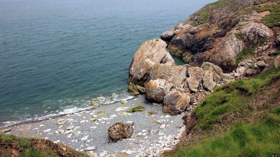 Man airlifted after cliff fall at Angel Bay, Conwy county - BBC News