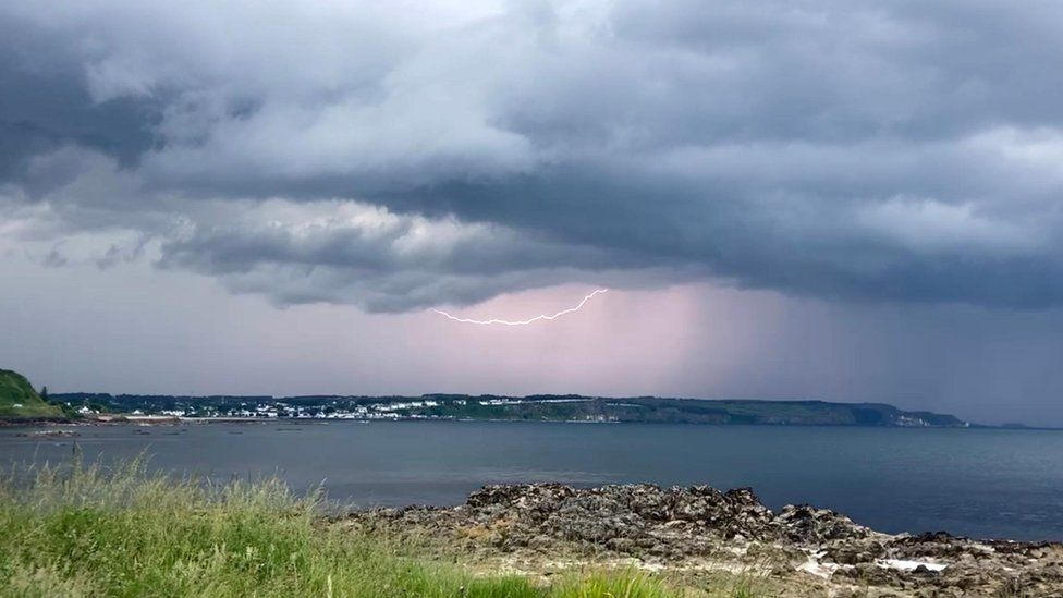 Northern Ireland weather: Heavy downpours hit some counties - BBC News