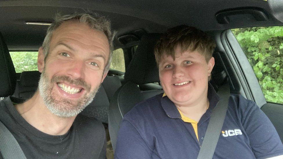 Iron Will: Cumbrian dad organises triathlon challenge - BBC News