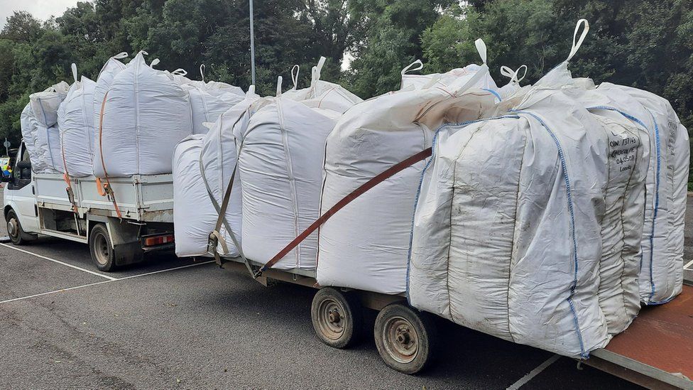 Vehicle carrier stopped by Norfolk Police for insecure load - BBC News