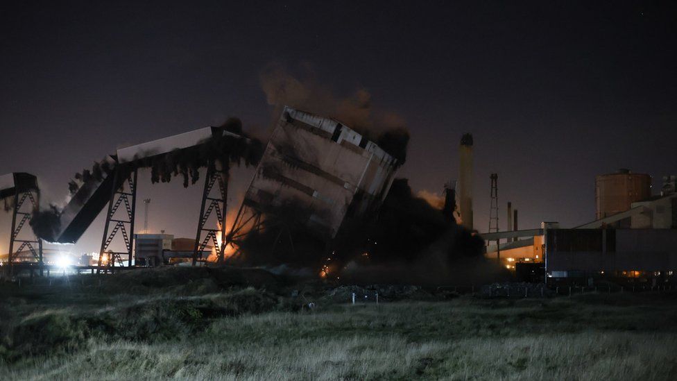 Redcar steelworks storehouse demolished in controlled explosion - BBC News