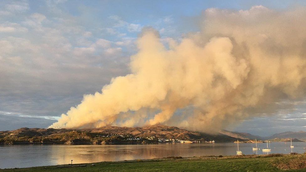 Crews battle wildfire near west Highlands village - BBC News