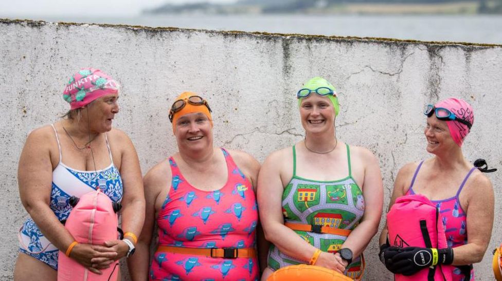In pictures: The Highlands' Kessock Ferry Swim - BBC News