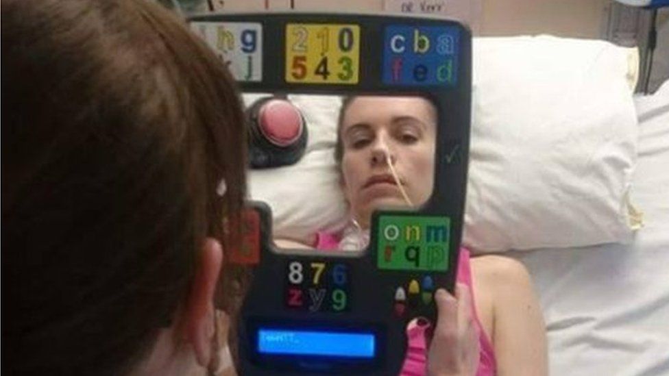 Clodagh Dunlop: Locked-in syndrome PSNI officer back to work - BBC News