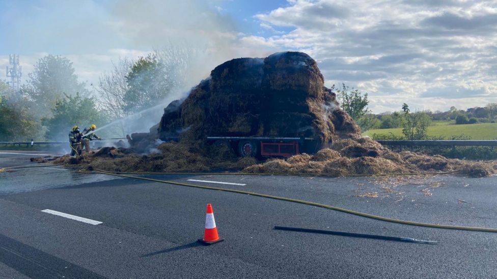 M4 reopens hours after lorry carrying hay catches fire - BBC News
