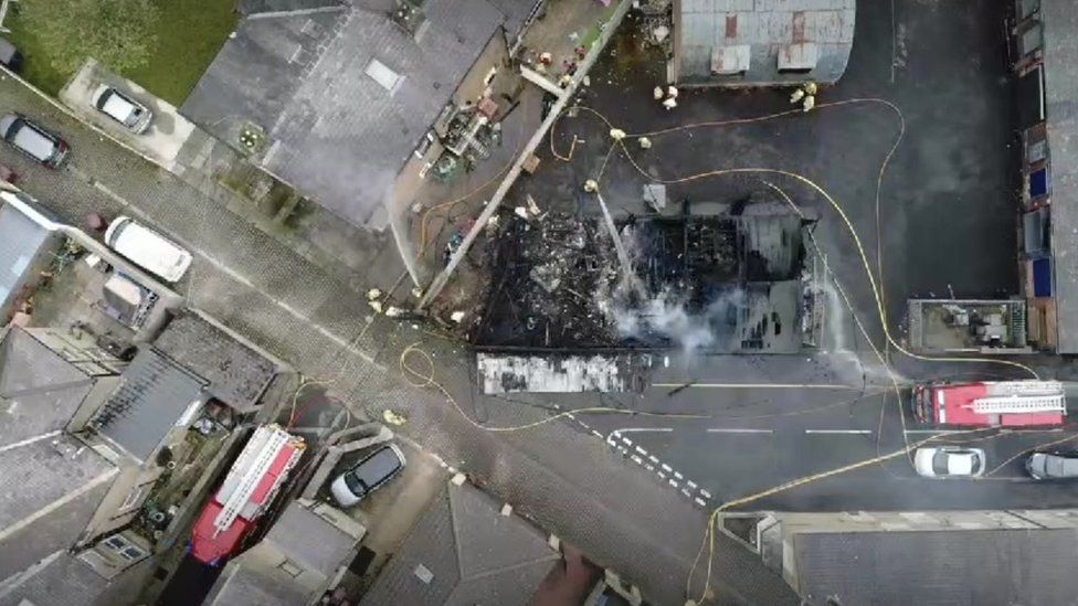 Burnley fire: Two boys, 13, arrested after blaze spreads to house - BBC ...