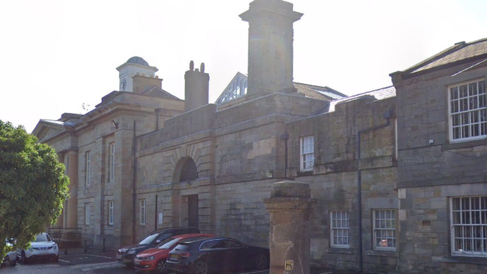 County Durham farmer accused of dumping car in road with tractor - BBC News