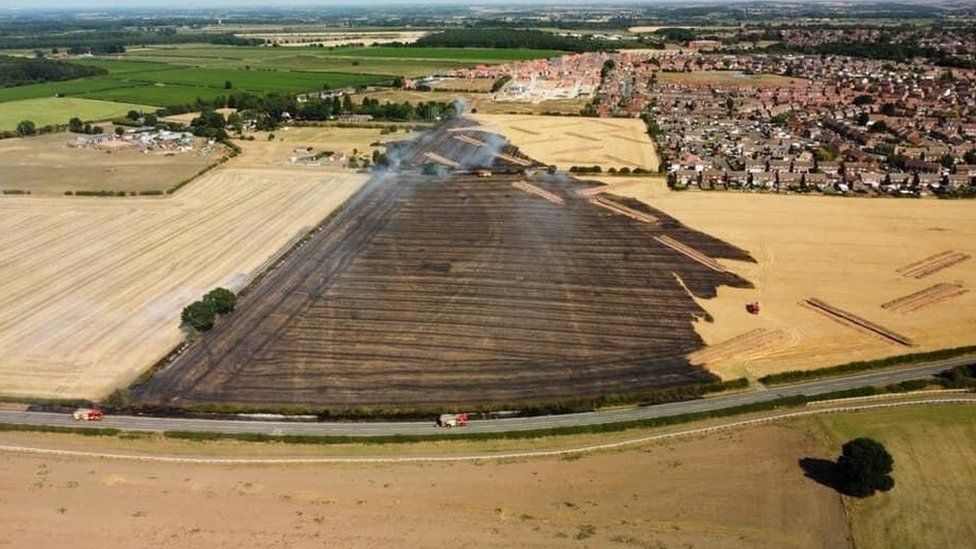 Harworth: Man arrested after firefighters tackle farmland blaze - BBC News