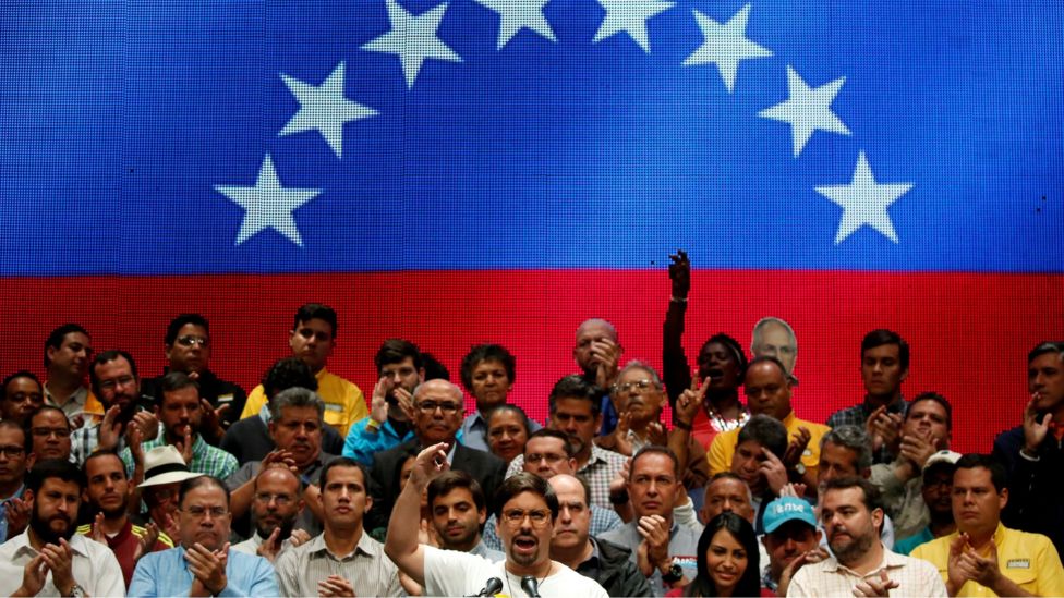 Venezuela crisis: Deadly clashes as millions join strike - BBC News