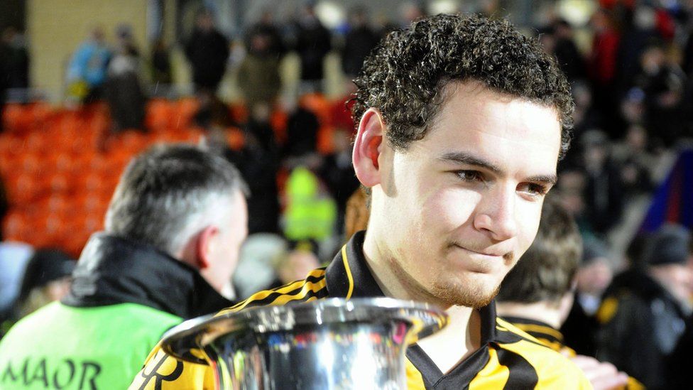 Racism in sport: Josh Magennis calls for 'ticket trail' - BBC News