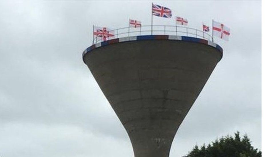 Rathfriland water tower has union flags removed - BBC News