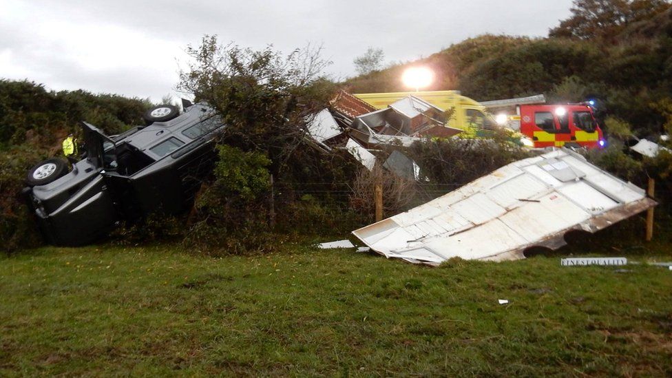 'Lucky escape' for family as Land Rover overturns - BBC News