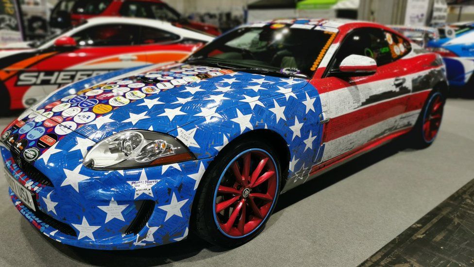 Jaguar sticker idea raises nearly £200k for children's charity - BBC News