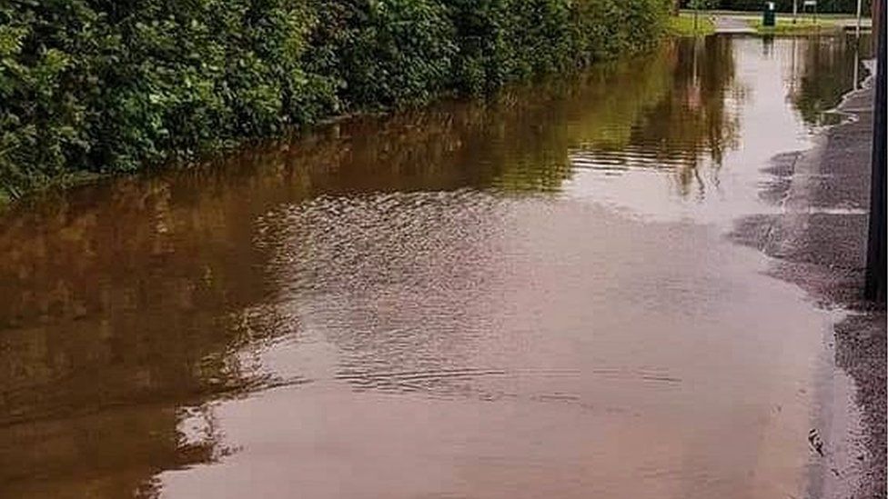 Congleton village shop floods 'up to thighs' as rain disrupts travel ...