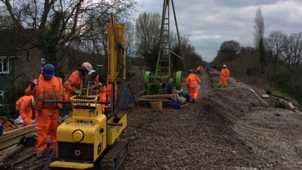 Farnham and Alton railway landslip work starts - BBC News