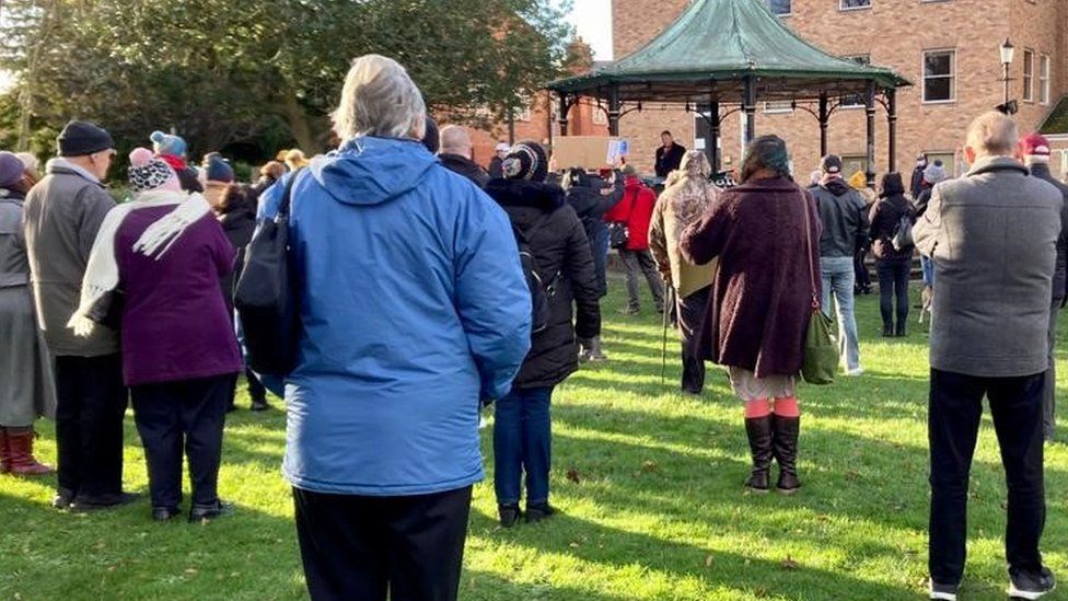 Wrexham's city status bid plan opposed by protesters - BBC News