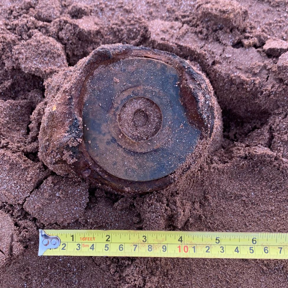 Unexploded WW2 bomb found on Paignton beach by metal detectorist - BBC News