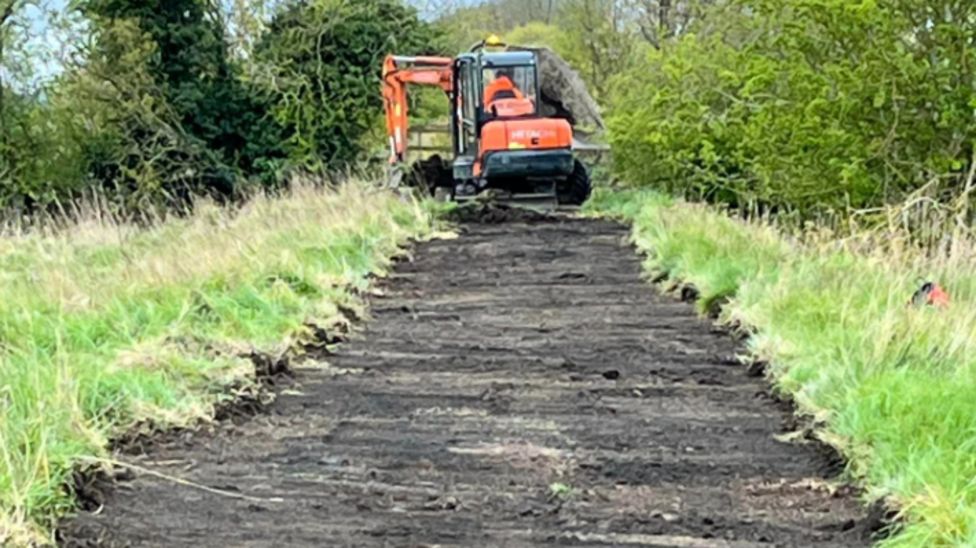Work begins to reopen former Northumberland rail line to walkers - BBC News