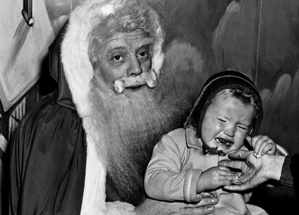 Caught on Christmas camera: Santa snaps over the decades - BBC News