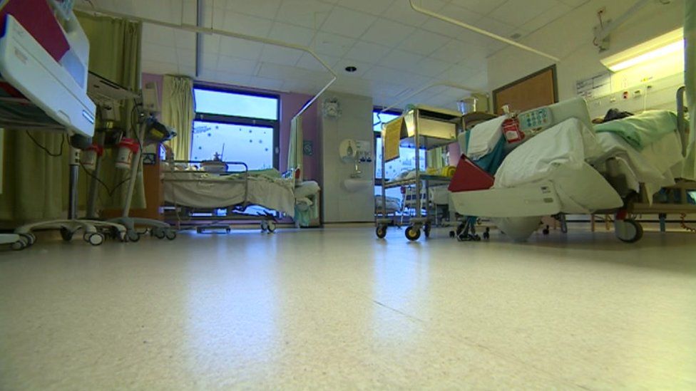 Covid: 'Challenging' increase in hospital patients - BBC News