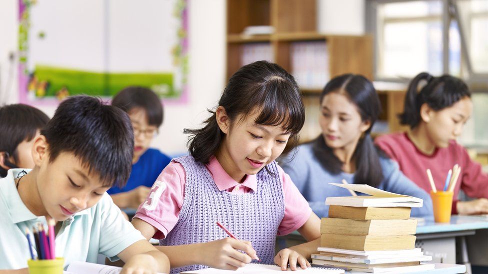 Chinese pupils to wear smart bracelet that tracks how often they put ...