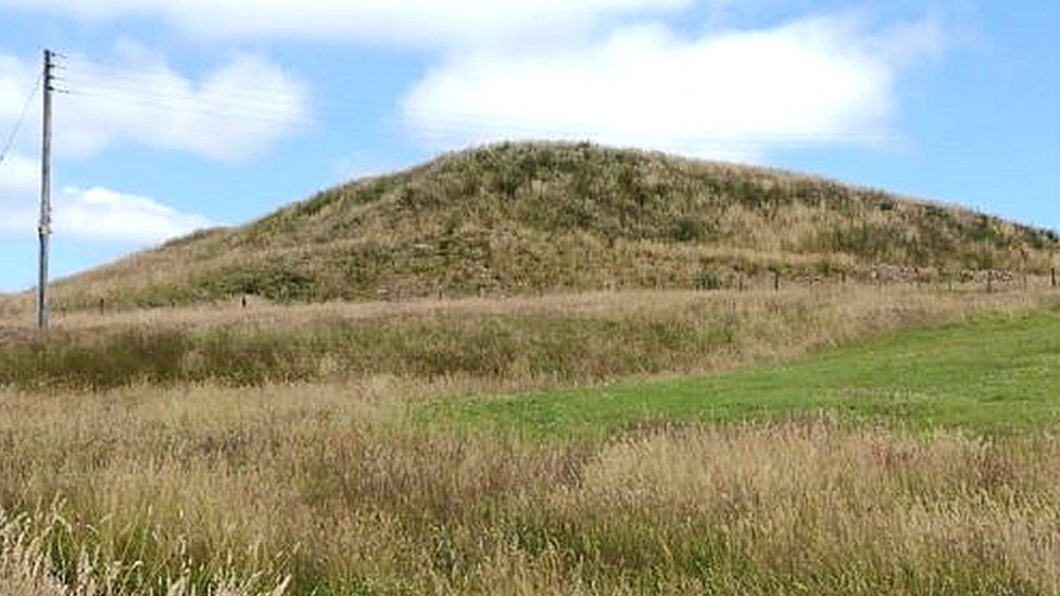 Blackburn earth mound unsightly and dangerous, locals say - BBC News
