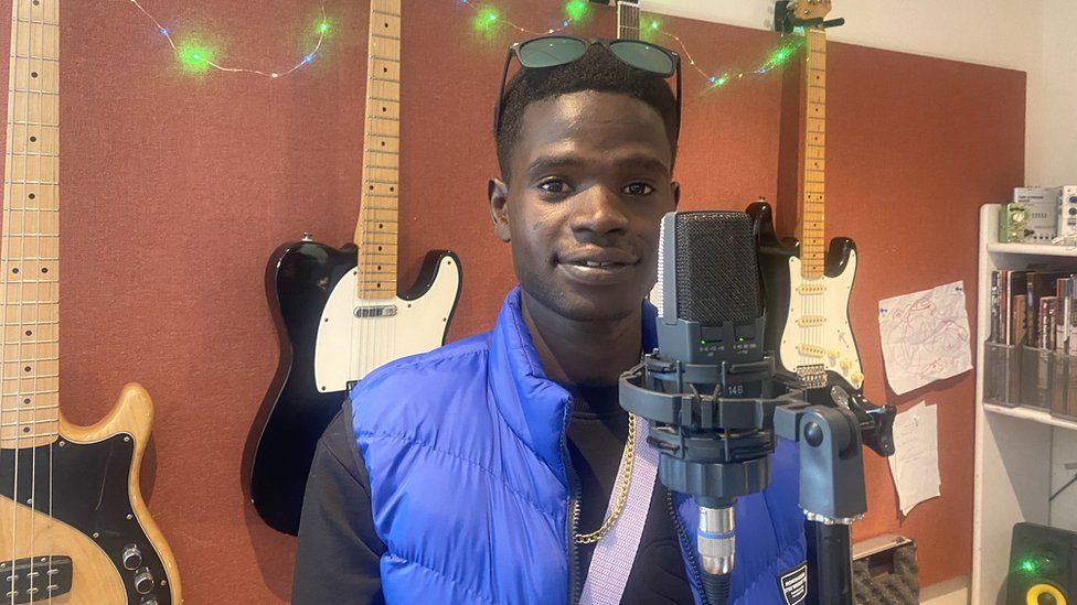 Young rapper seeking asylum in UK shares his story - BBC News