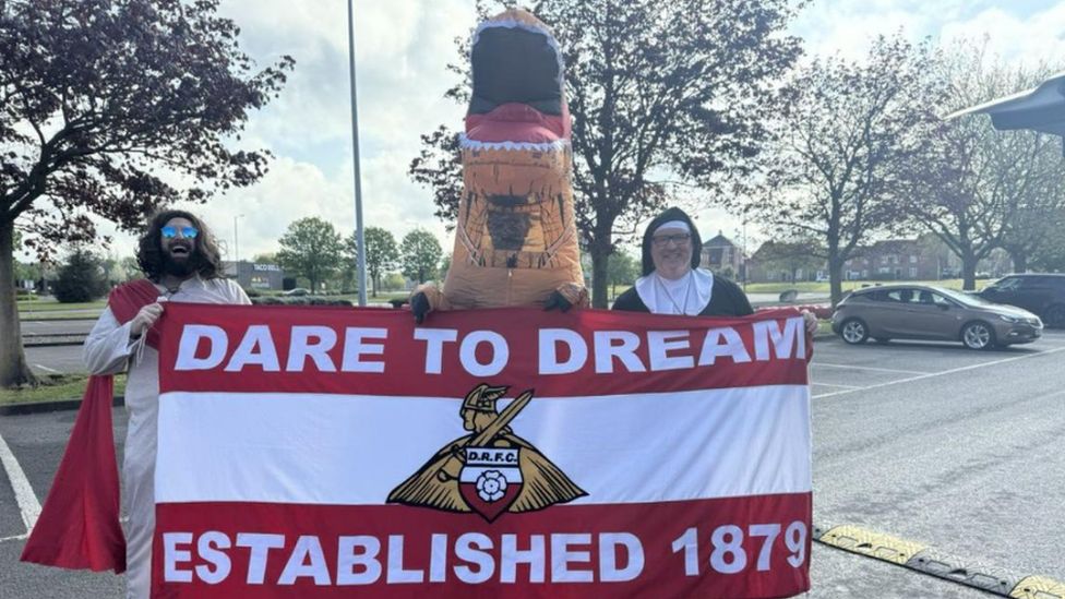 Doncaster Rovers fan wins £9,000 after placing £20 bet - BBC News