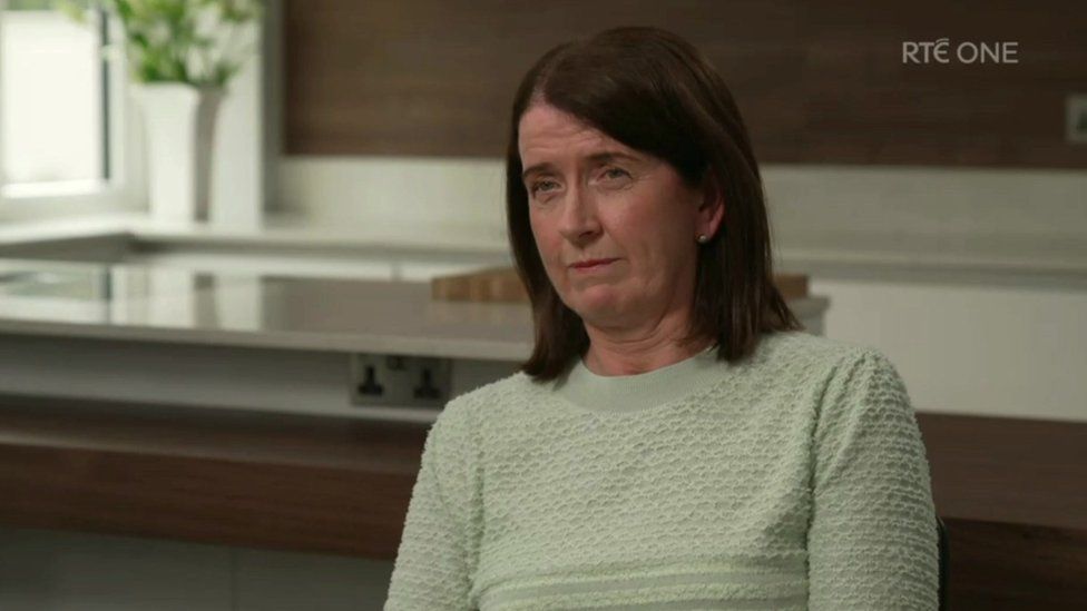 Injured football fan walks again with exoskeleton - BBC News