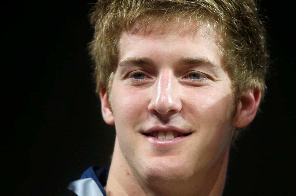 Rio Olympics: US swimmer Jimmy Feigen 'settles robbery row' - BBC News