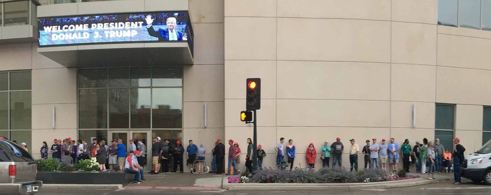 Trump fans sleep on pavement to glimpse 'our president' - BBC News