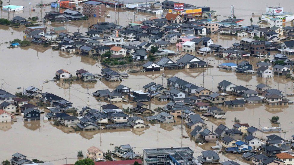 Japan floods: Heavy rain and floods cause huge damage - BBC Newsround