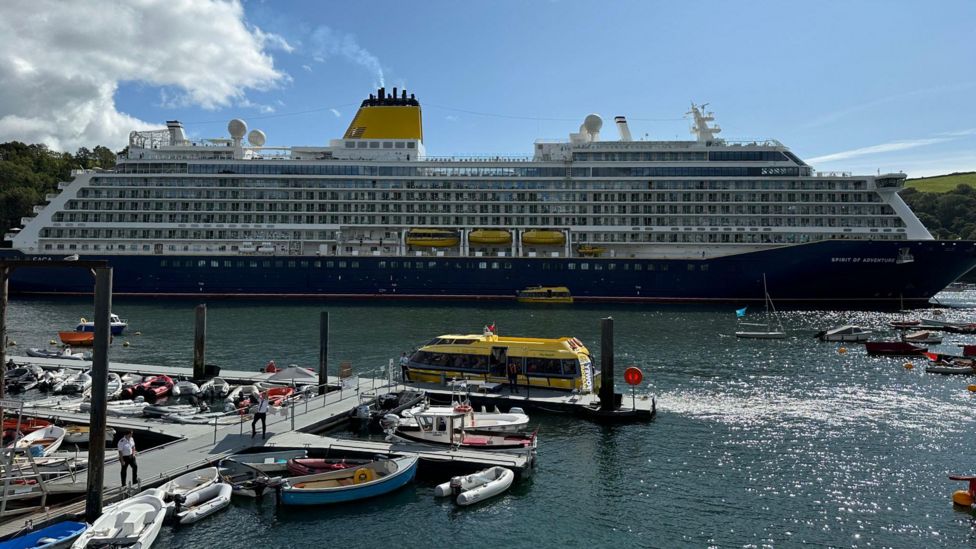 Cruise ship is biggest to ever dock in Fowey - BBC News