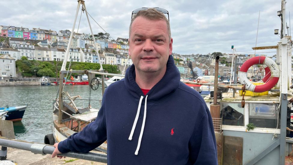 Brixham 'open for business' despite parasite outbreak - BBC News