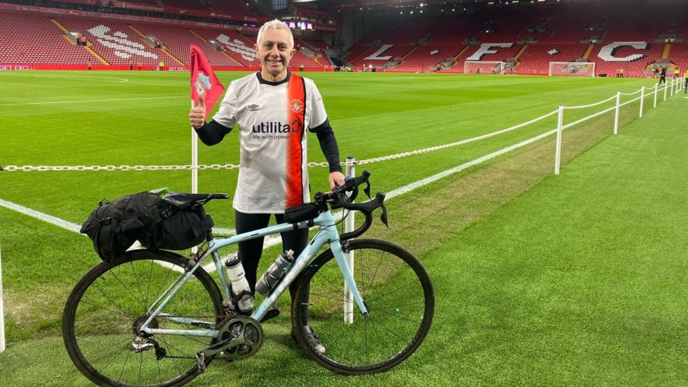 Luton Town fan near end of 8,000-mile stadiums cycle challenge - BBC News