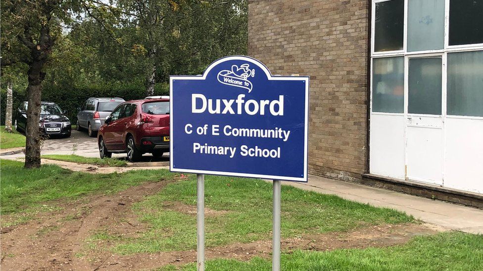 Duxford Primary School welcomes pupils back after fire - BBC News